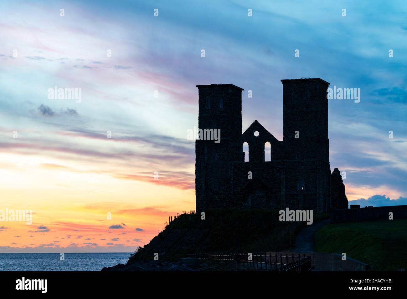 The twin tower ruins of the Anglo Saxon church on the seafront at ...