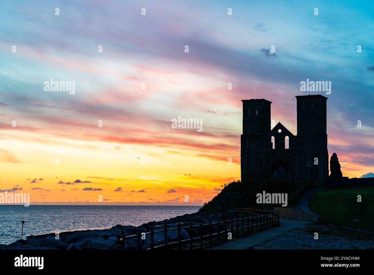 The twin tower ruins of the Anglo Saxon church on the seafront at ...