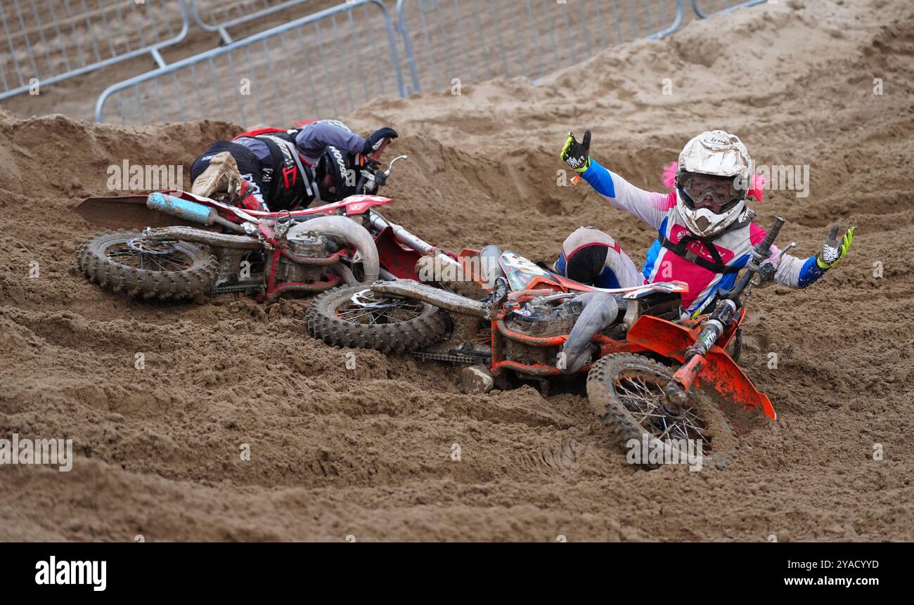 Competitors in the 65cc crash on a dune during the ROKiT Weston Beach ...