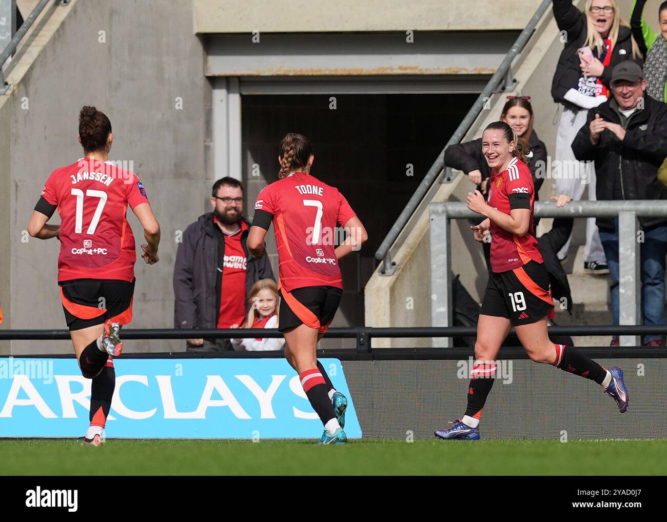 Manchester United's Elisabeth Terland (right) celebrates scoring their ...