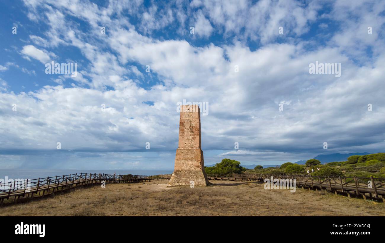 Ancient watchtower called Torre Ladrones in the dunes of Artola ...