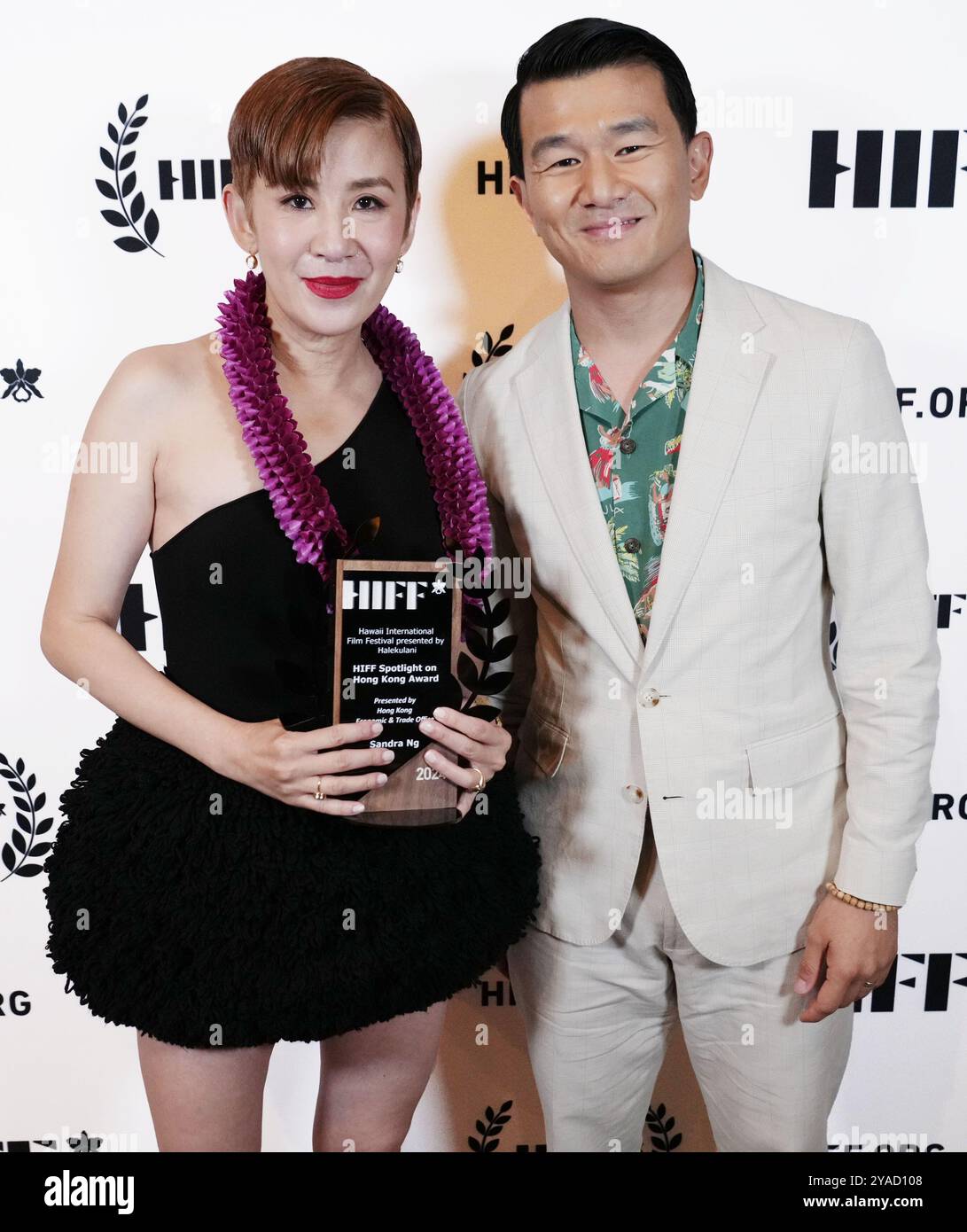 (L-R) Sandra Ng honored with the HIFF Spotlight Hong Kong Award and ...
