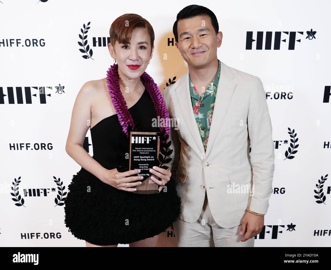 (L-R) Sandra Ng honored with the HIFF Spotlight Hong Kong Award and ...