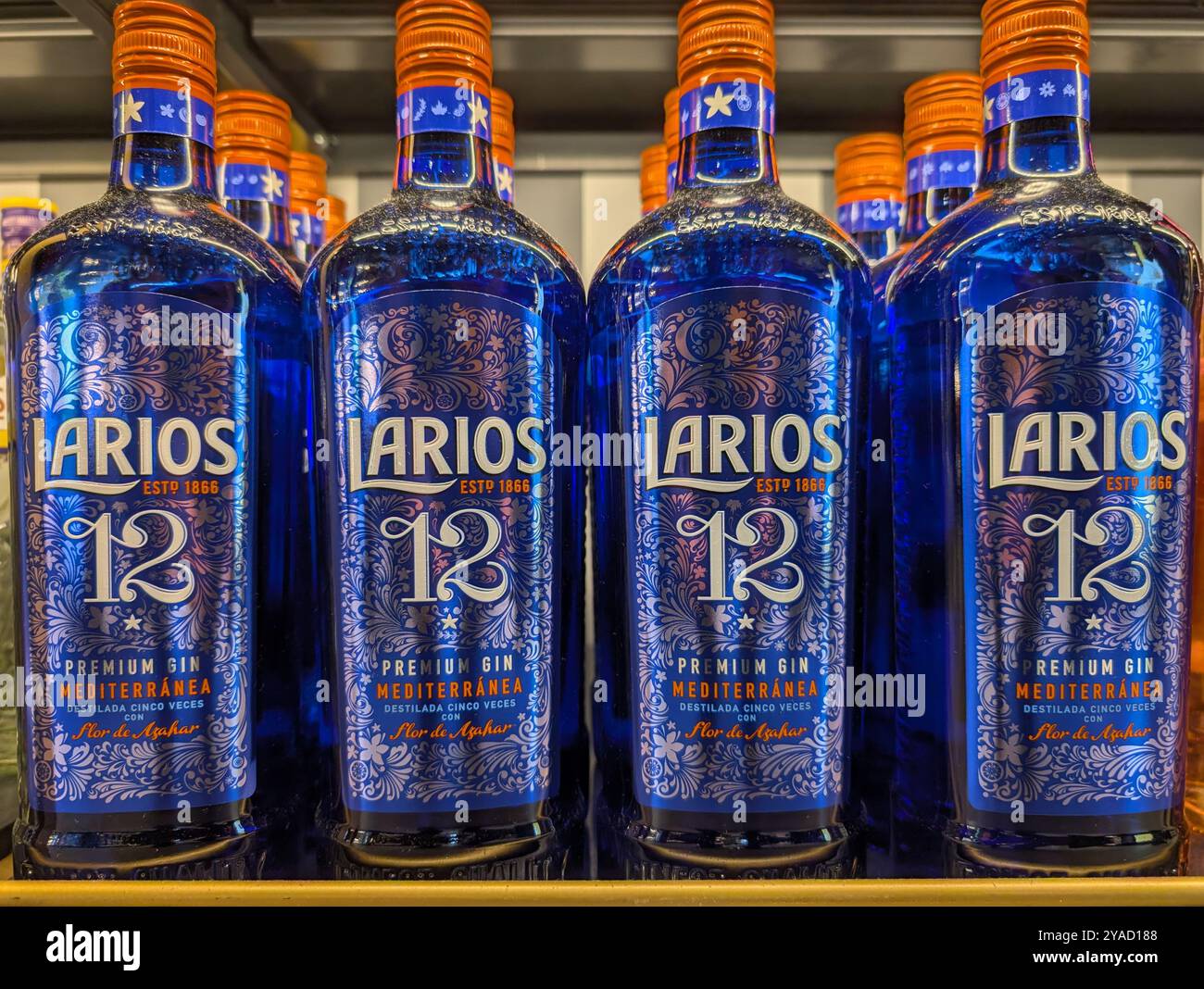 Larios 12 gin bottles in a store Stock Photo - Alamy
