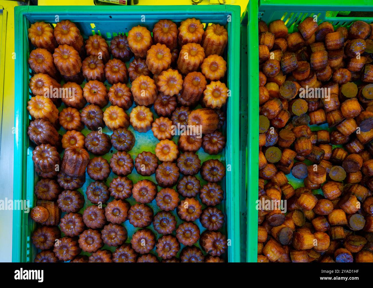 Baked Canele, French pastry flavored with rum and vanilla, specialty of ...