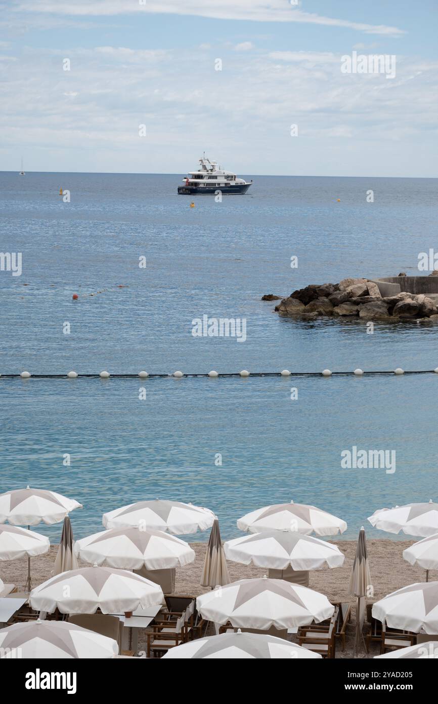 Sandy beach in Monaco, Monte-Carlo Lavrotto beach with clear sea water ...