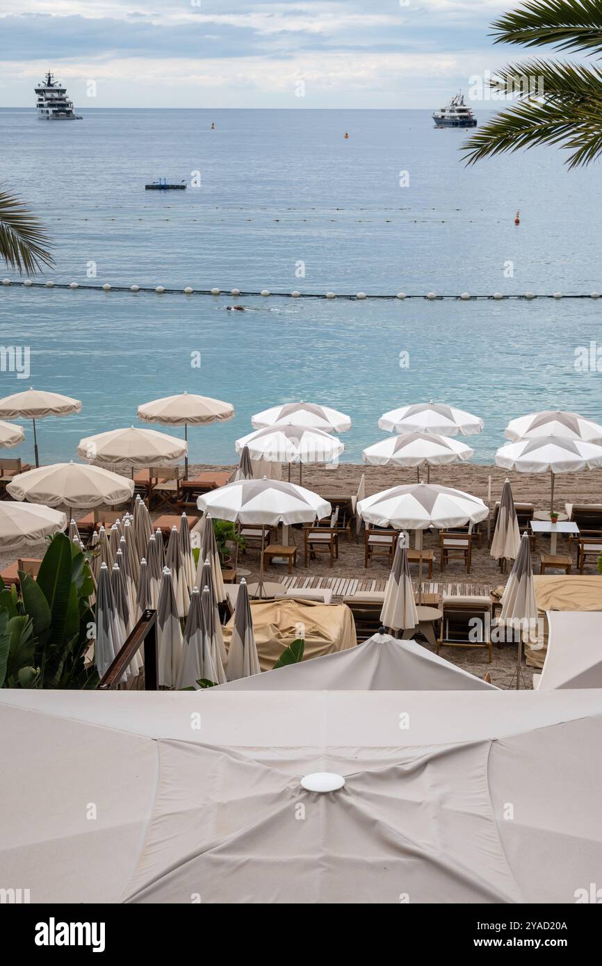 Sandy beach in Monaco, Monte-Carlo Lavrotto beach with clear sea water ...