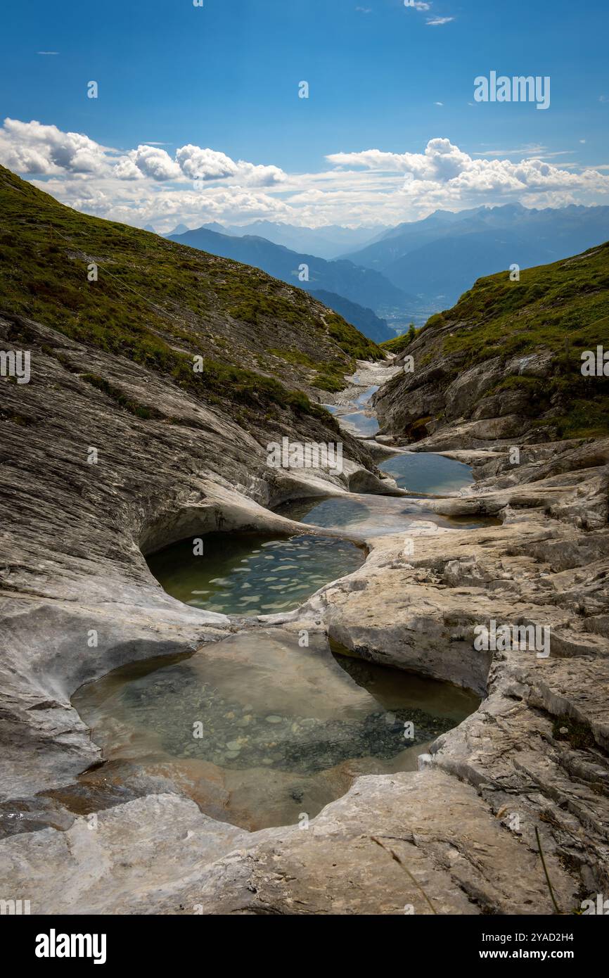 A beautiful walk on alp mora in Switzerland, Natural pools created by ...
