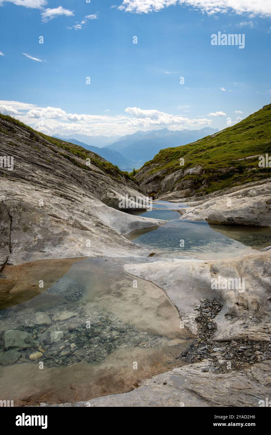 A beautiful walk on alp mora in Switzerland, Natural pools created by ...