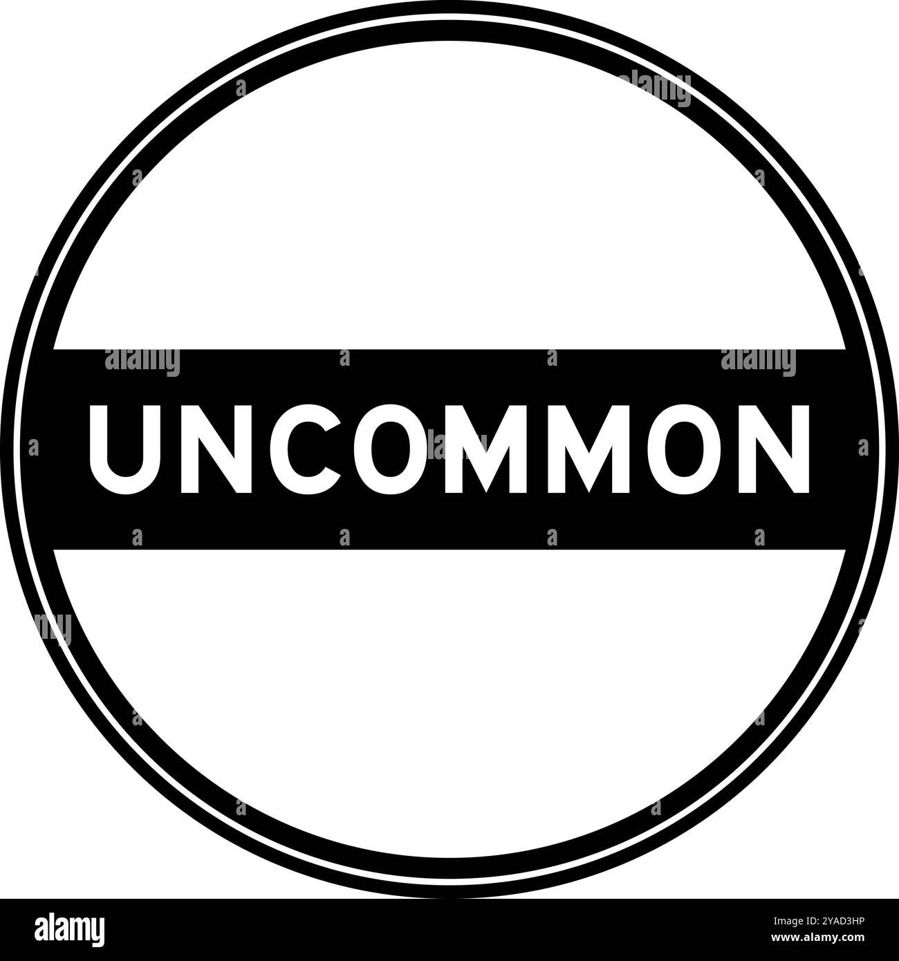 Black color round seal sticker in word uncommon on white background ...