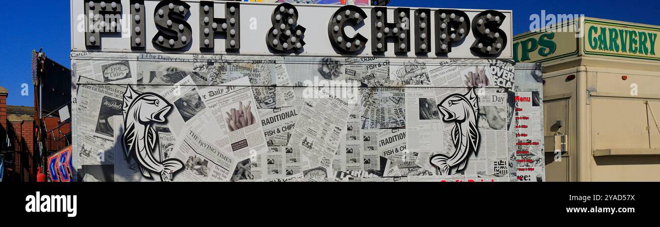 Closed up Fish and Chips van with black and white newspaper decoration ...