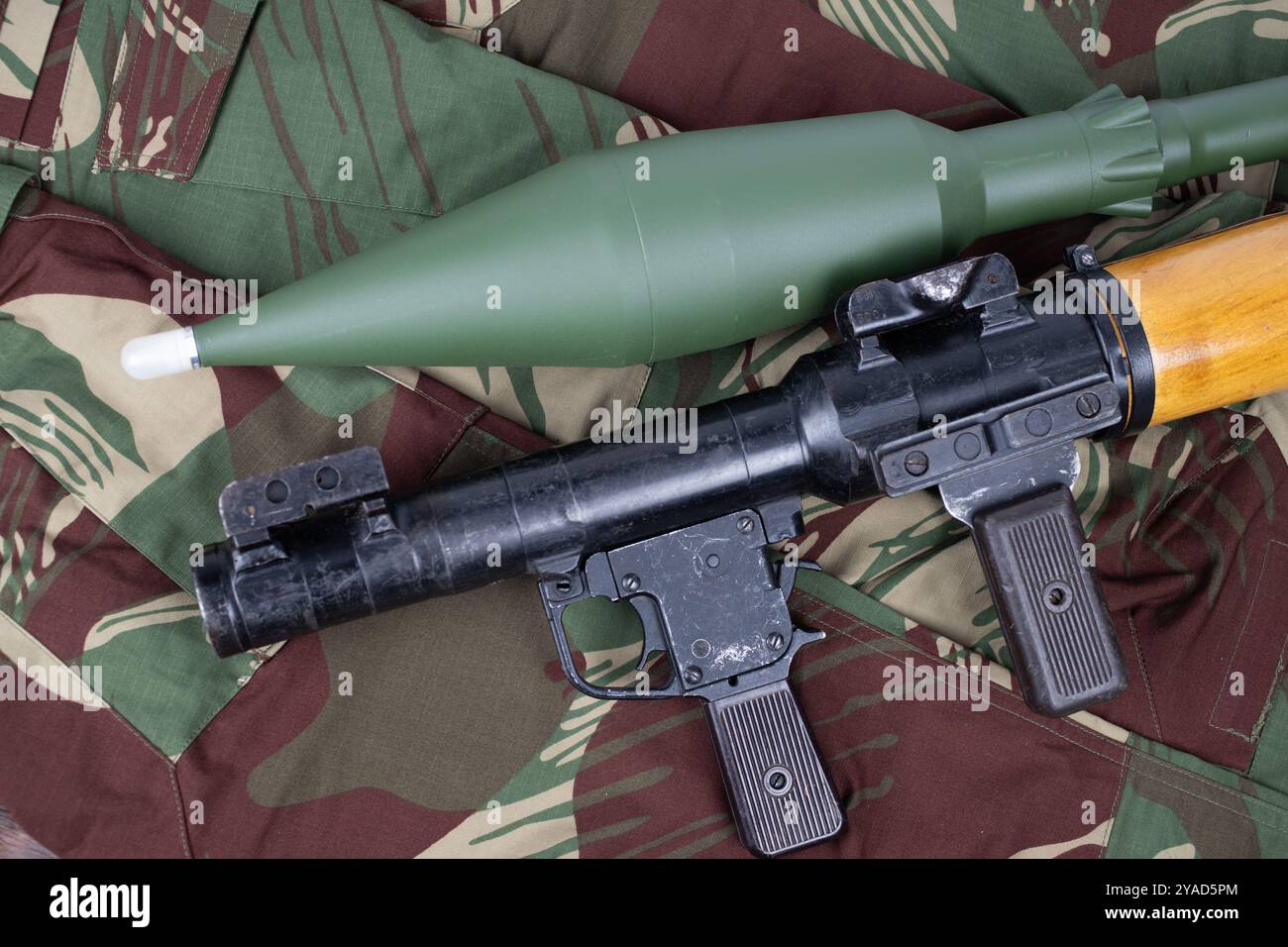 rocket propelled grenade launcher RPG 7 on camo uniform background ...