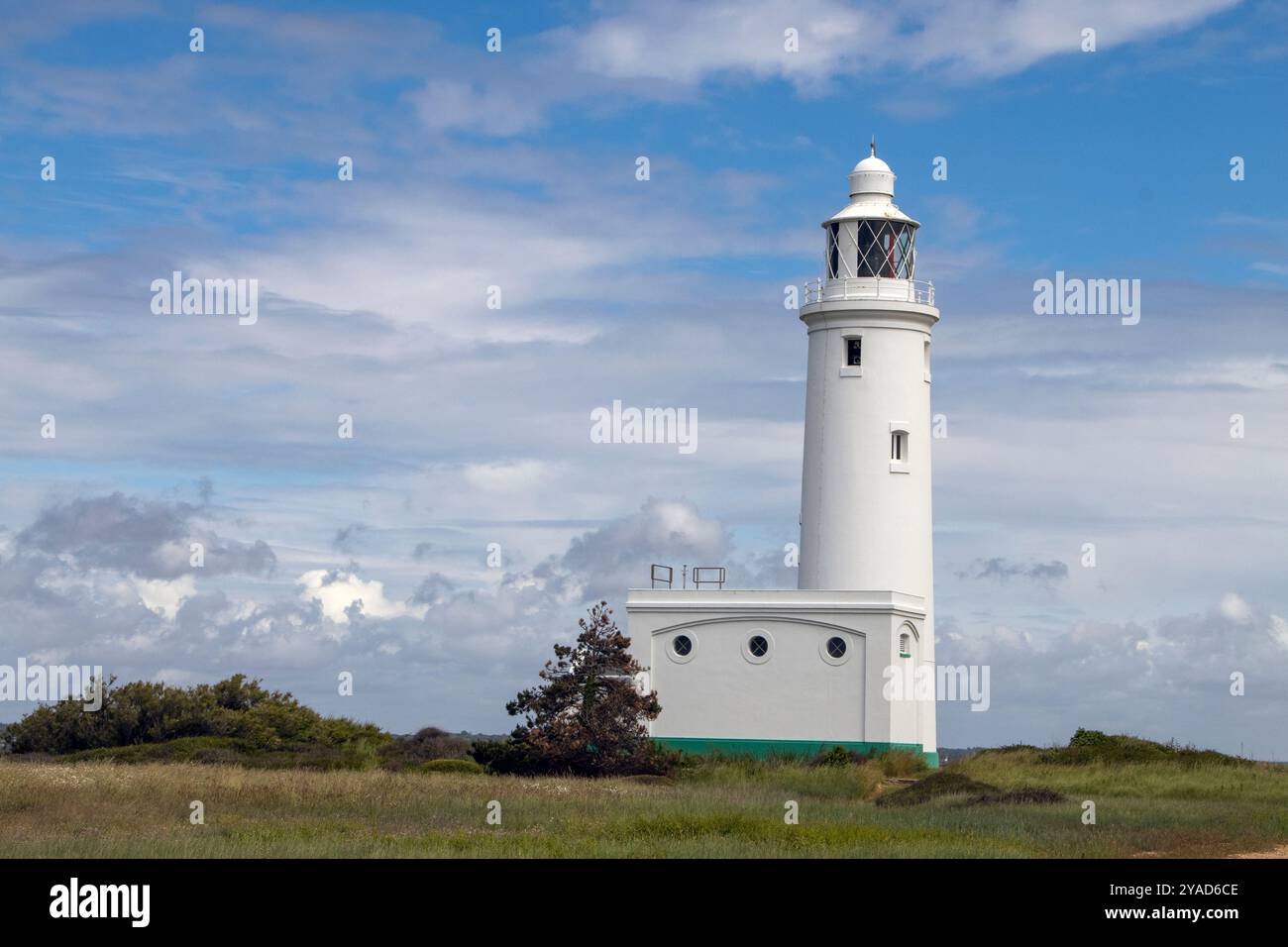 Hurst Point Lighthouse in summer sunshine Stock Photo - Alamy