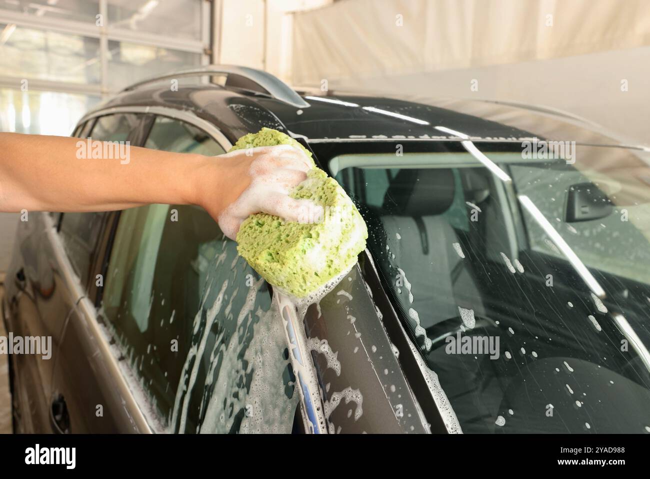 Closeup hand washing car hi-res stock photography and images - Alamy