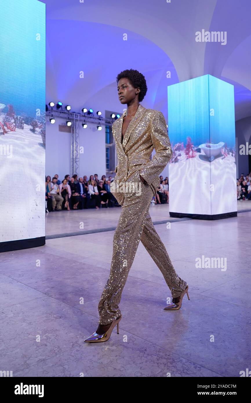 A model walks the runway during Carlos Gil fashion show at Lisboa ...