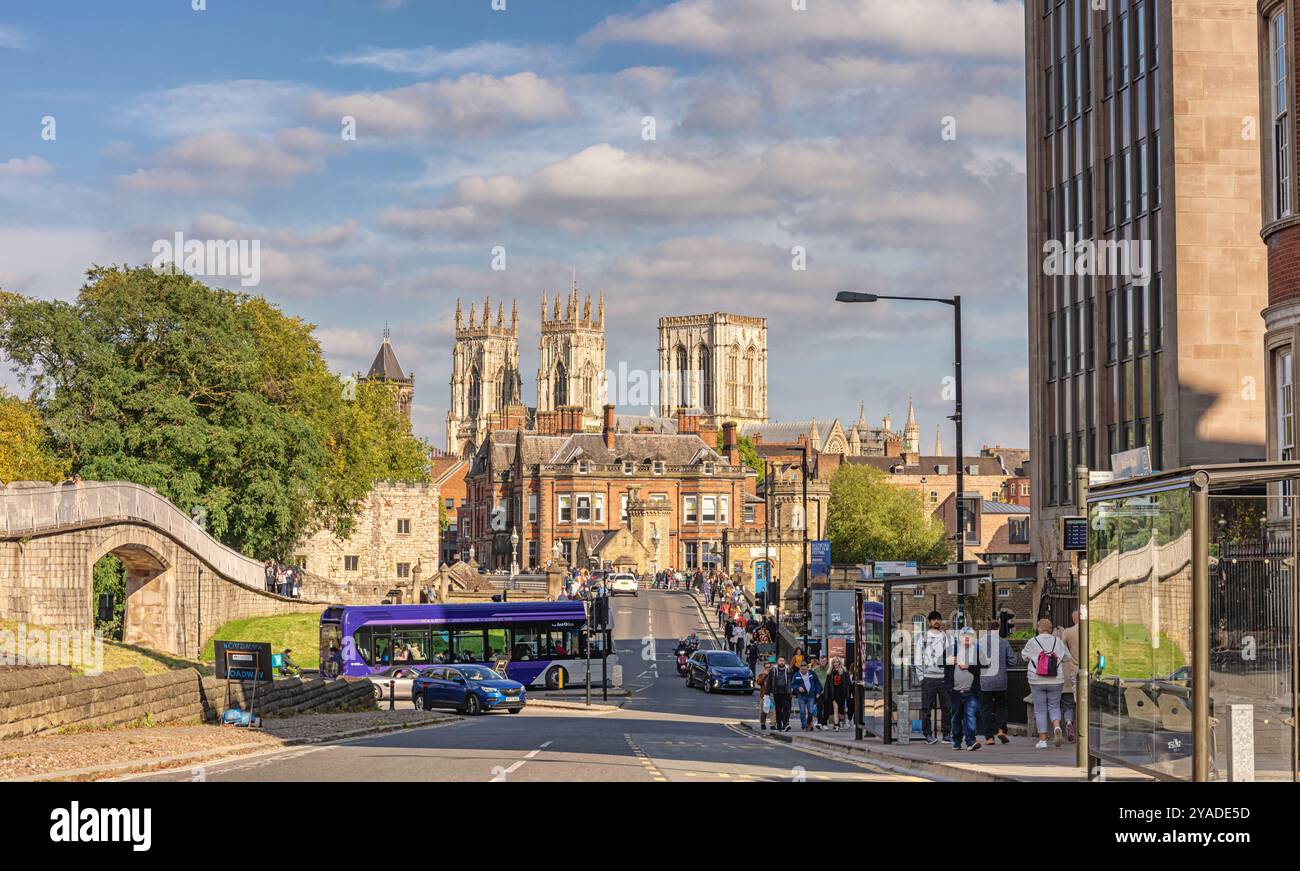 A street view down to a bridge and some historic buildings. An ancient ...