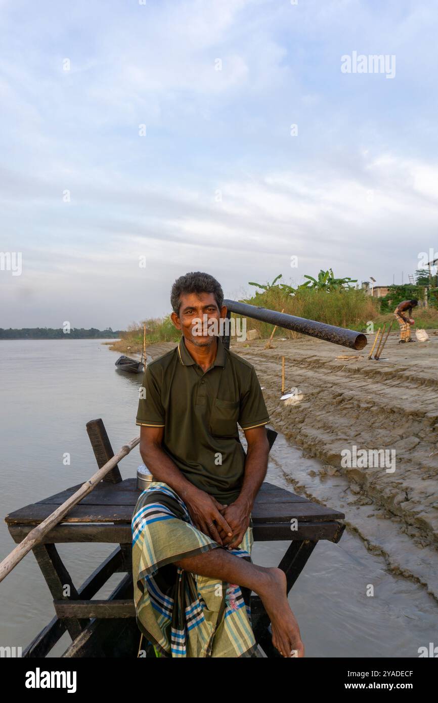 A Bangladeshi Boatman. The smiling face of the sailor of Kheya Ghat ...