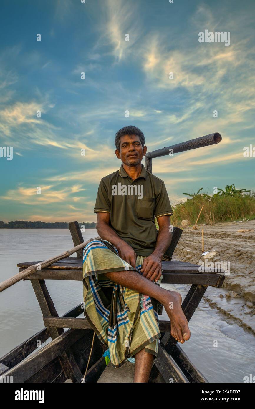 A Bangladeshi Boatman. The smiling face of the sailor of Kheya Ghat ...