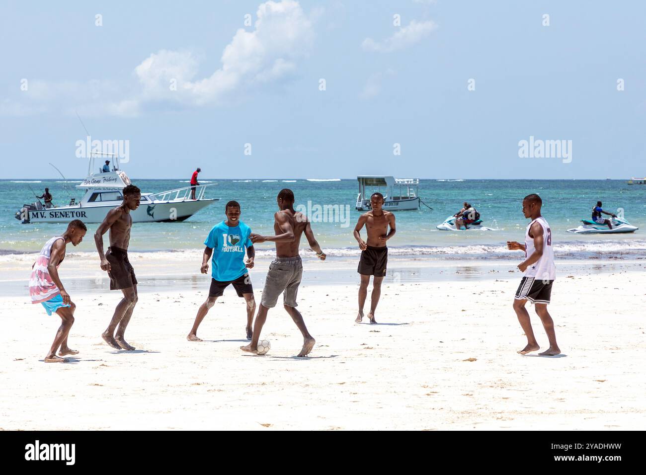 Local boys playing football on Diani Beach, Indian Ocean, Galu district ...