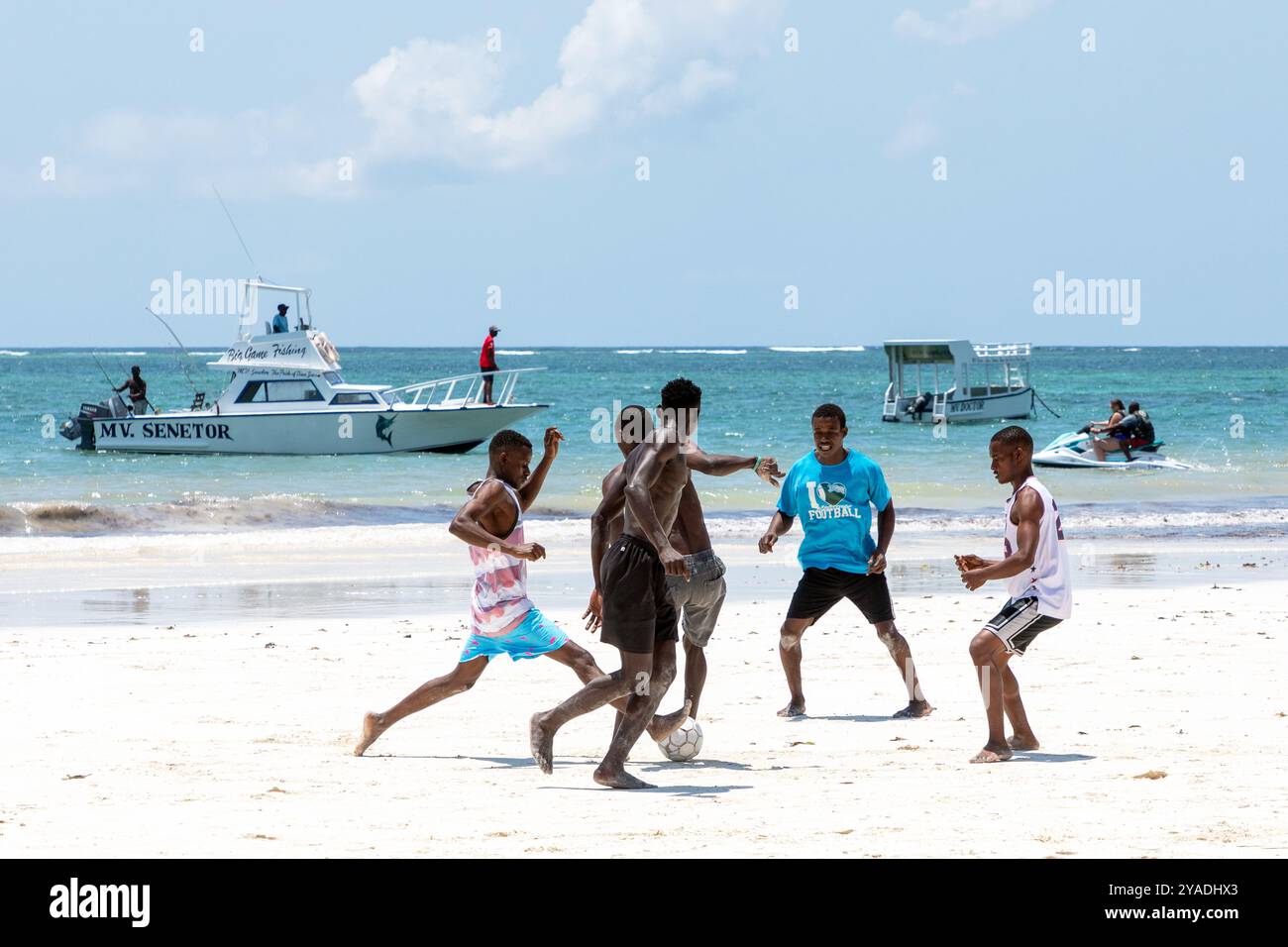 Local boys playing football on Diani Beach, Indian Ocean, Galu district ...