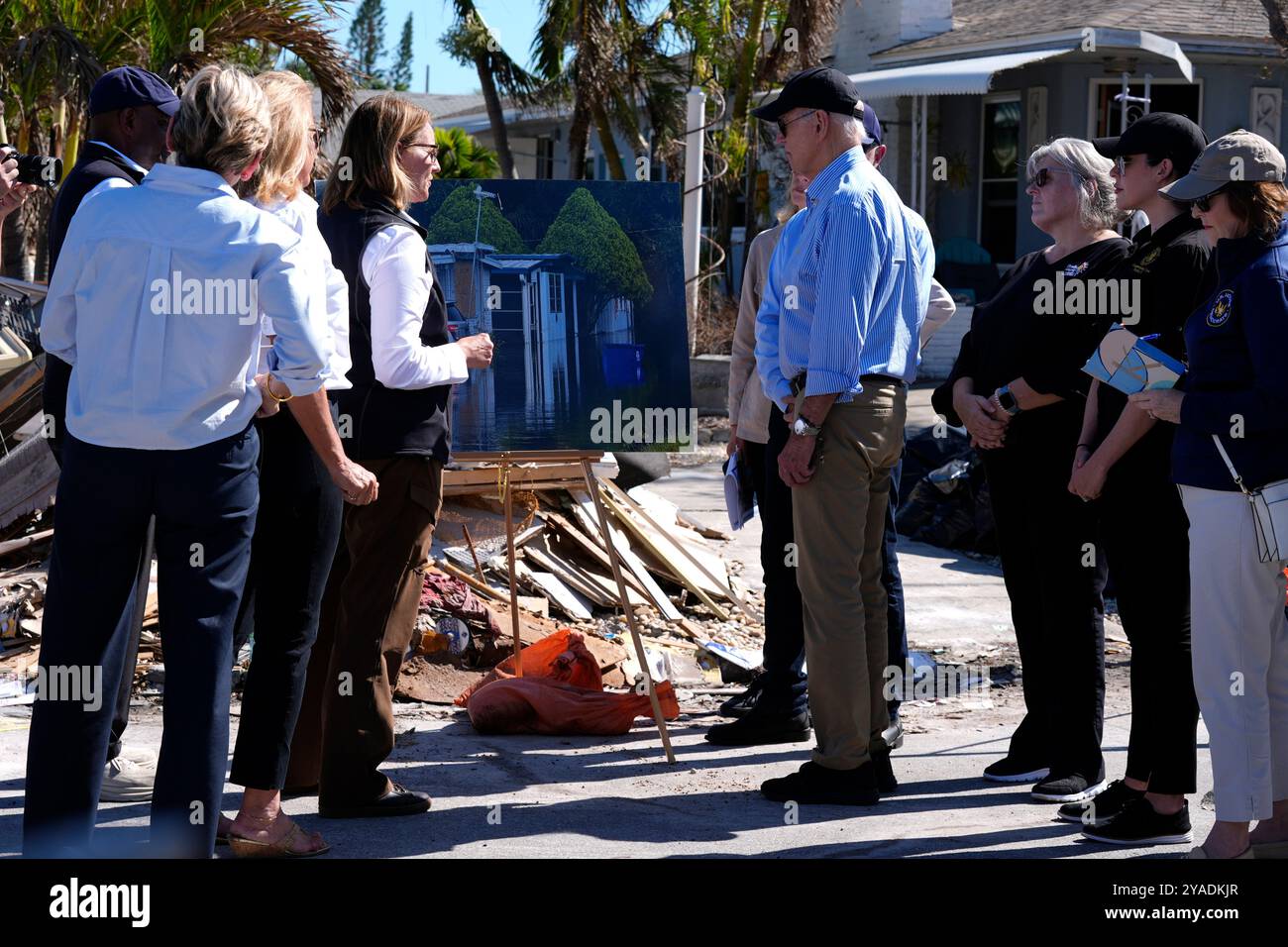 President Joe Biden, center right, is briefed by federal, state, and ...