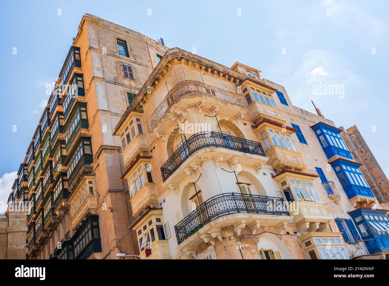 Traditional Maltese buildings with colourful balconies in historical ...