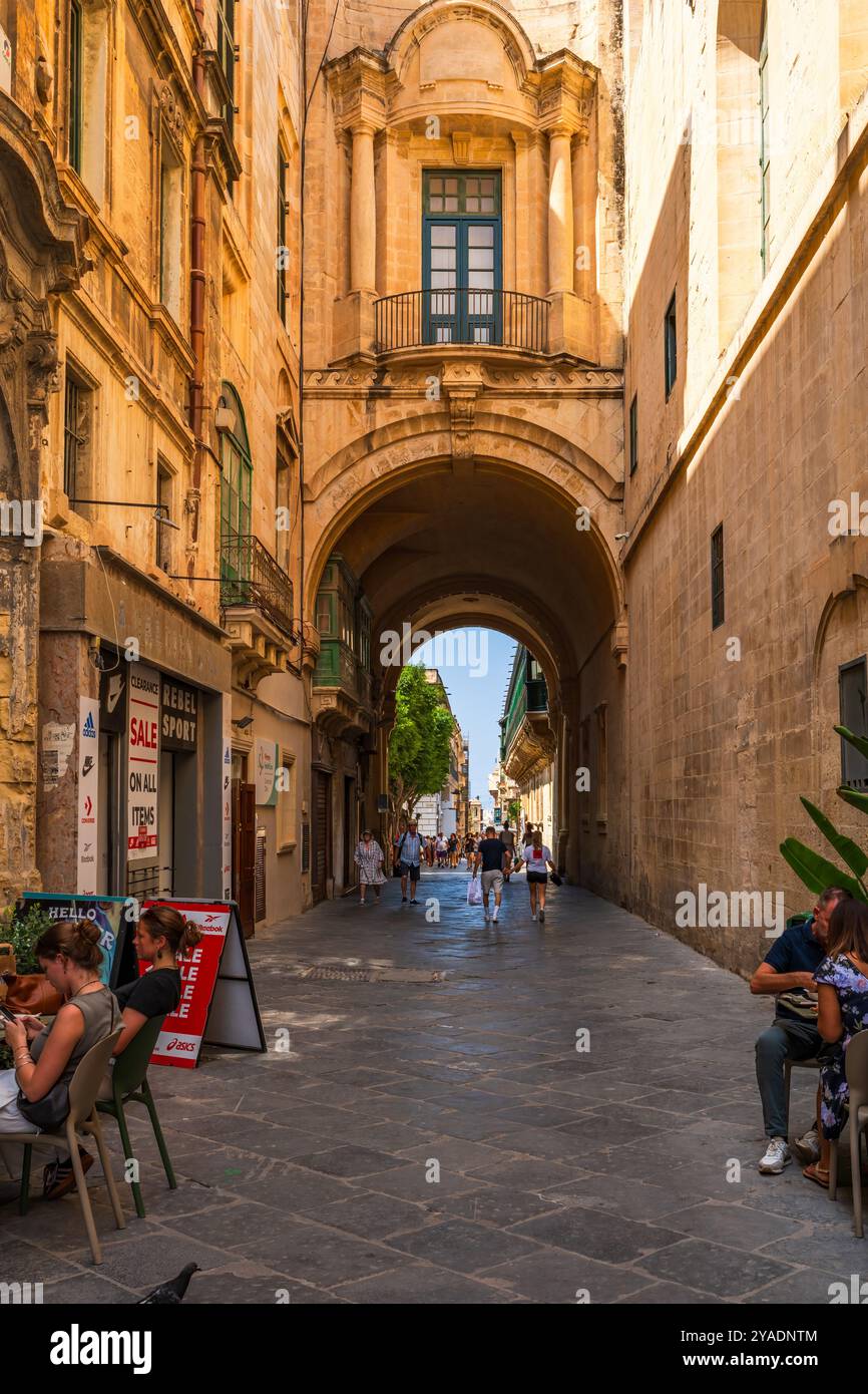 VALLETTA, MALTA - AUGUST 30 2024: Narrow street in Valletta with ...