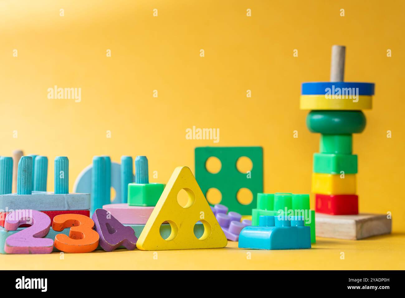 A colorful arrangement of educational toys including number blocks ...