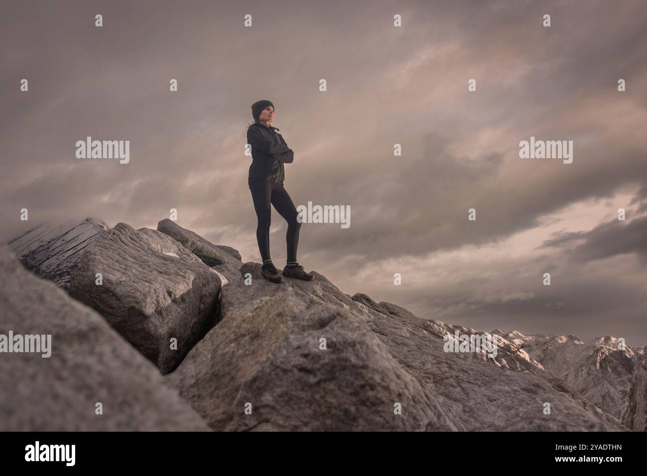 Woman walking on rocky viewpoint hi-res stock photography and images ...