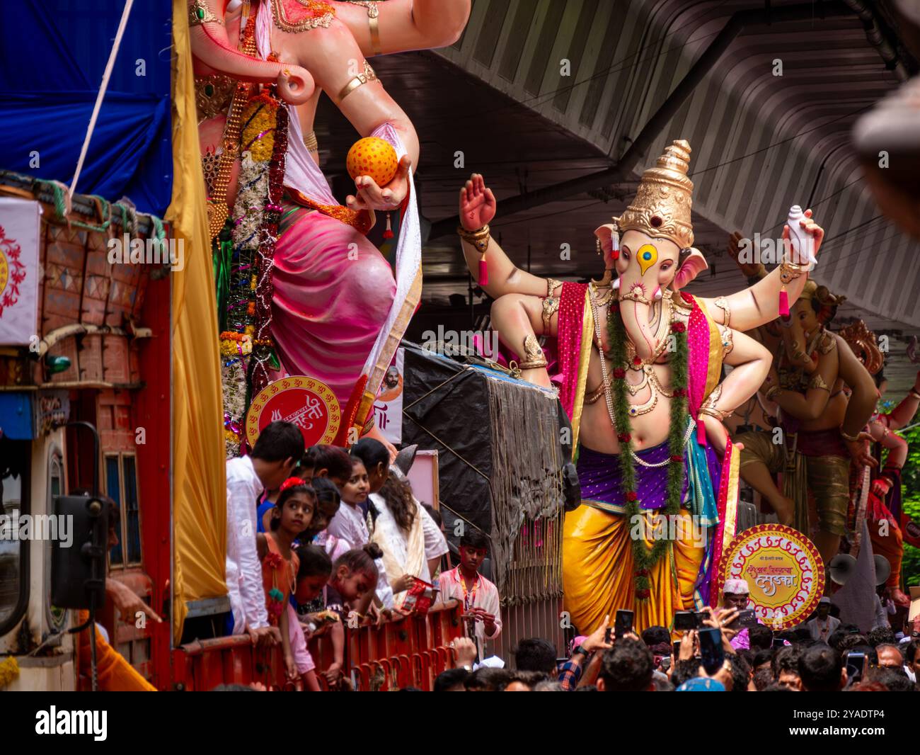 MUMBAI, INDIA - Sept 28, 2023 : Thousands of devotees bid adieu to tallest Lord Ganesha with ...