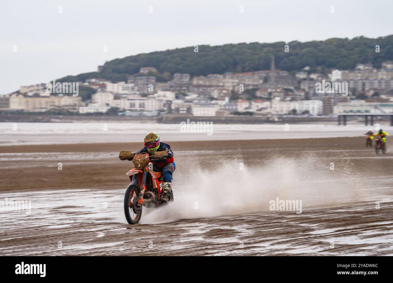 Bikes race along the beach at the start of the ROKiT Weston Beach Race ...