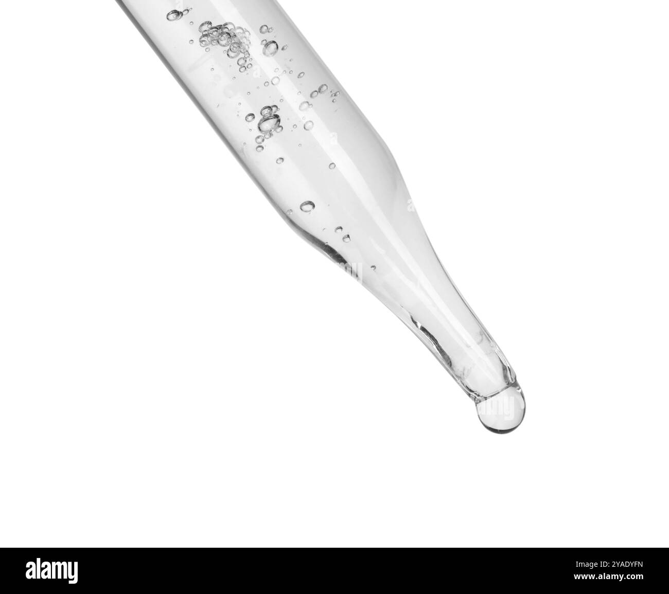 Dripping cosmetic serum from pipette on white background Stock Photo ...