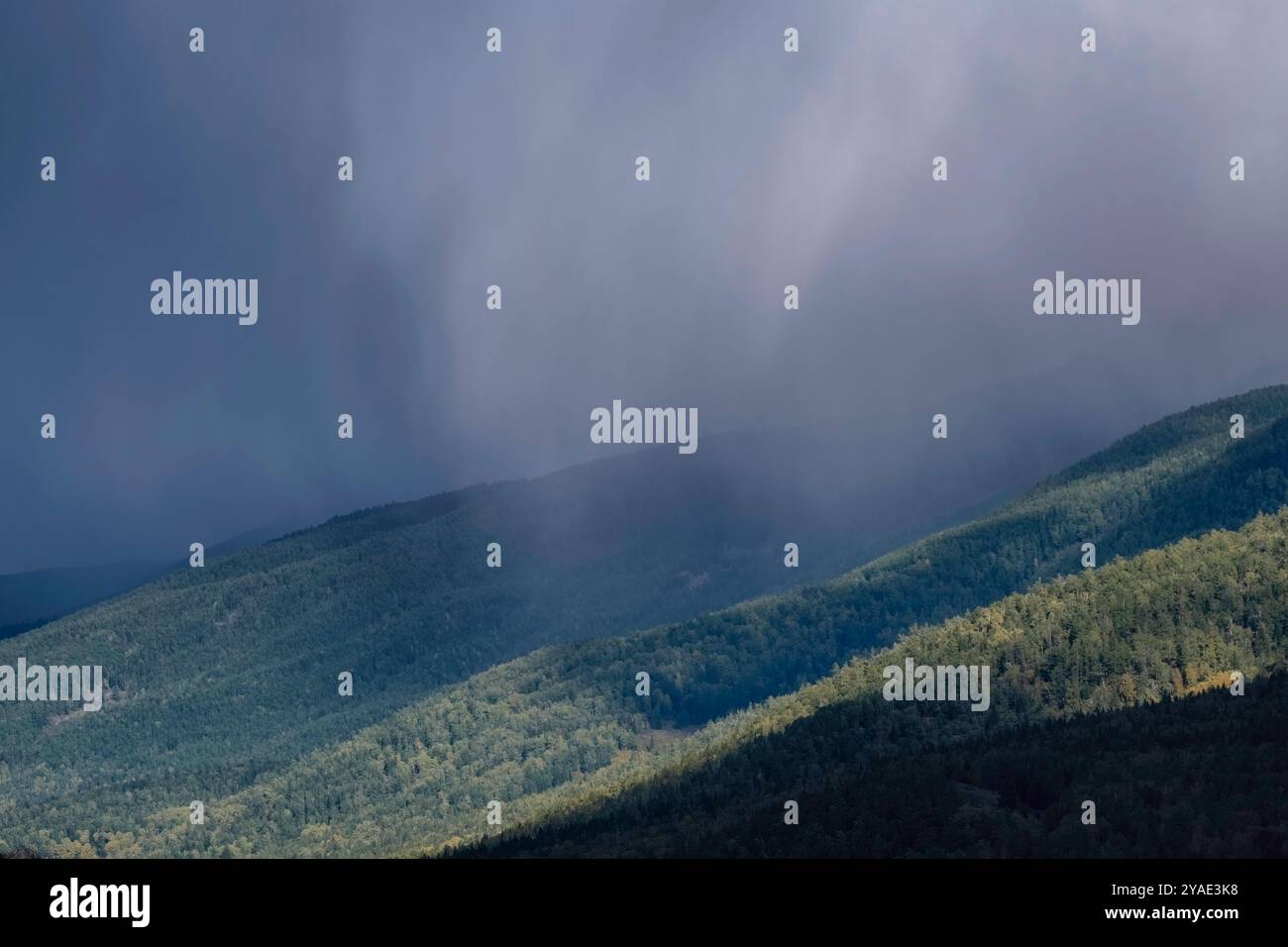 Rain shower over mountains hi-res stock photography and images - Alamy