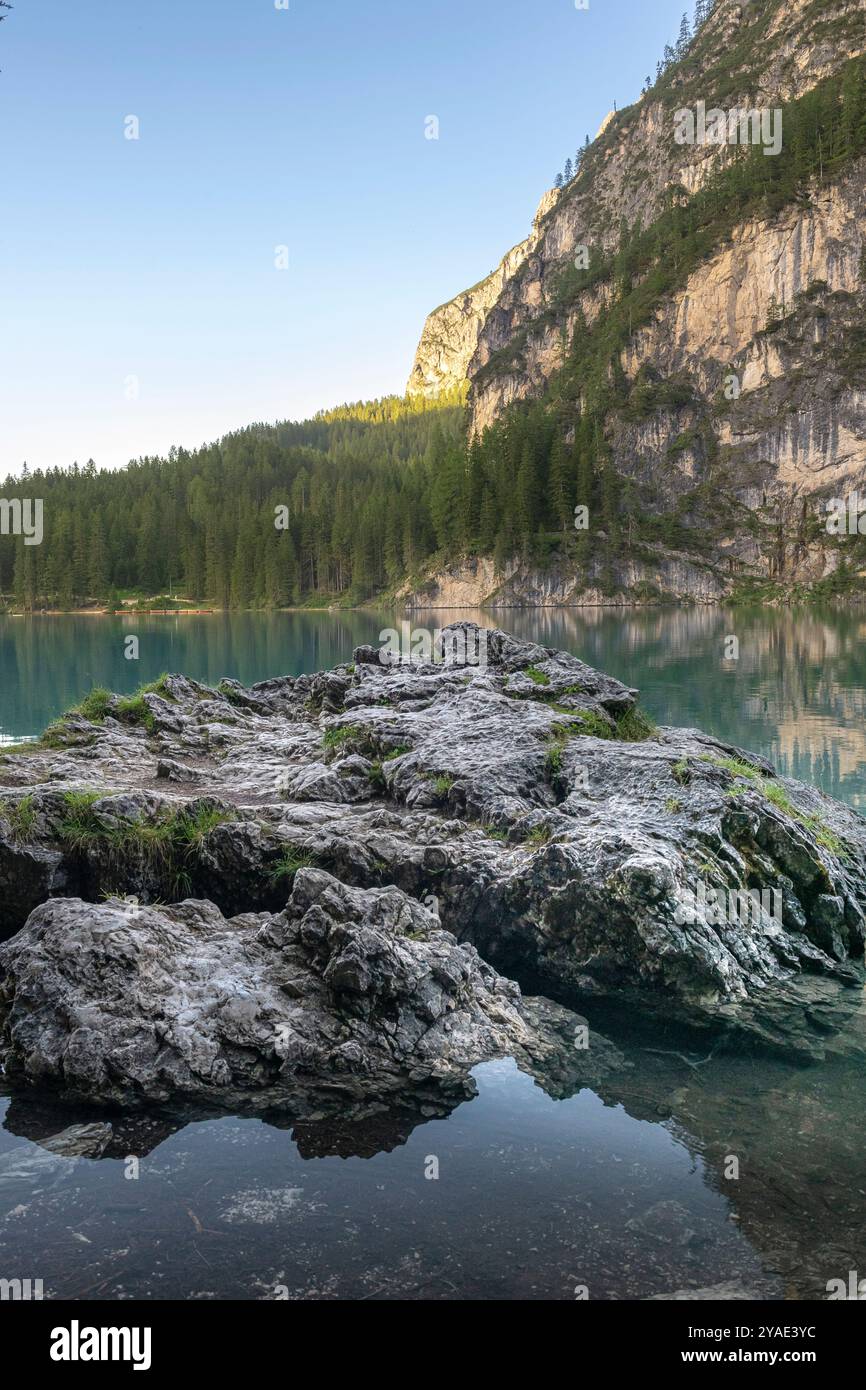 Rugged Rocks Reflecting in the Emerald Waters of Pragser Wildsee, with ...