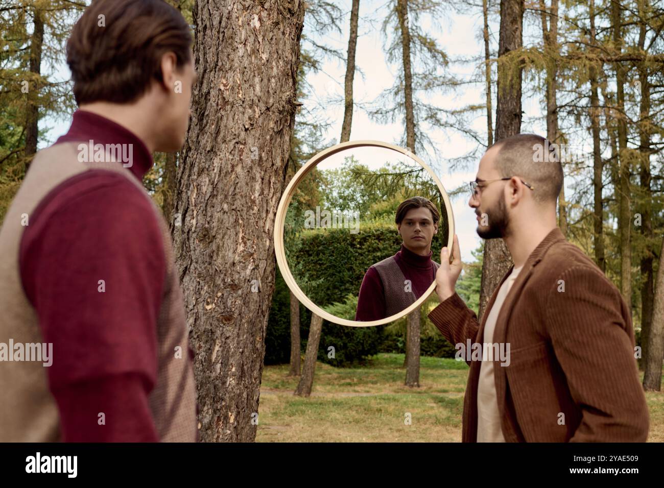 Two dapper men enjoy the crisp autumn air while admiring their ...