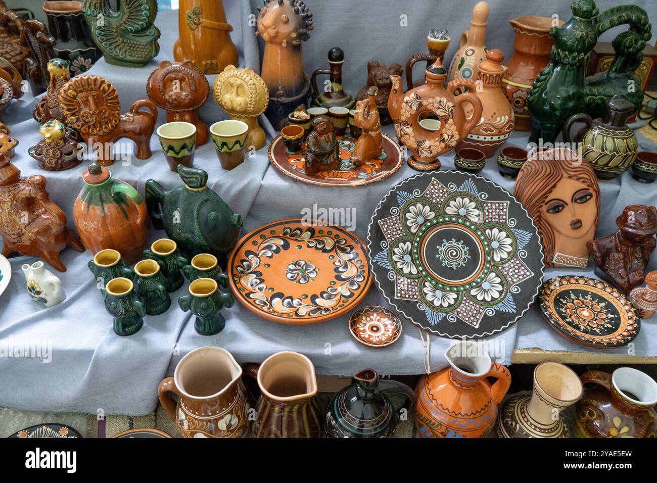 Different decanter and figurines. Ukrainian dishes. Clay ceramics food ...