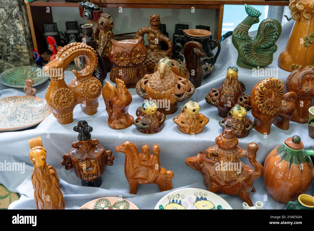 Different Ukrainian dishes. Clay ceramics figurines food plate decor ...