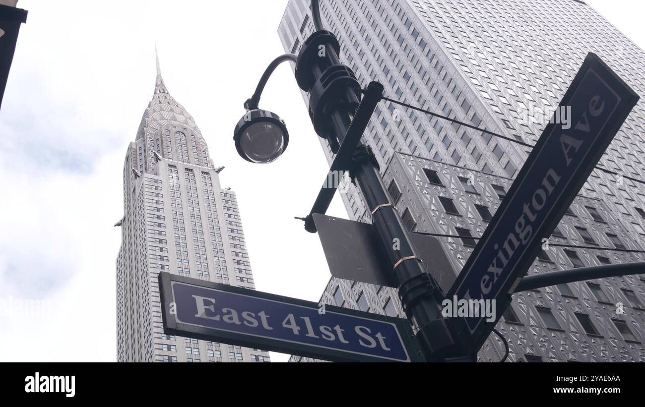 New York City crossroad, street intersection road sign on post ...