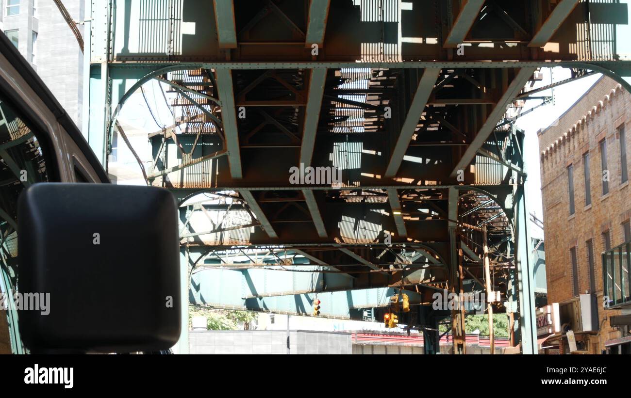 New York elevated subway, metropolitan bridge, metro track above street ...