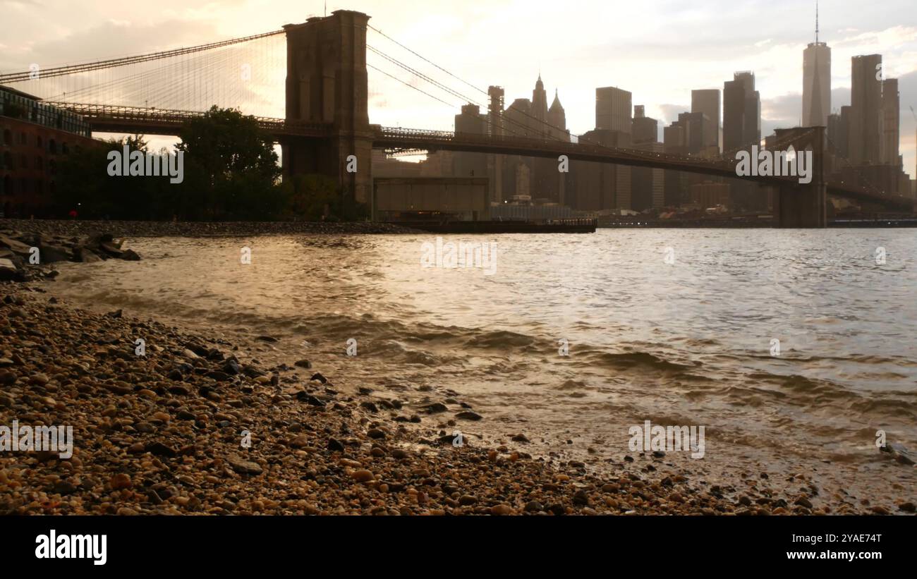 Brooklyn Bridge, rainy foggy day. New York City Manhattan downtown ...