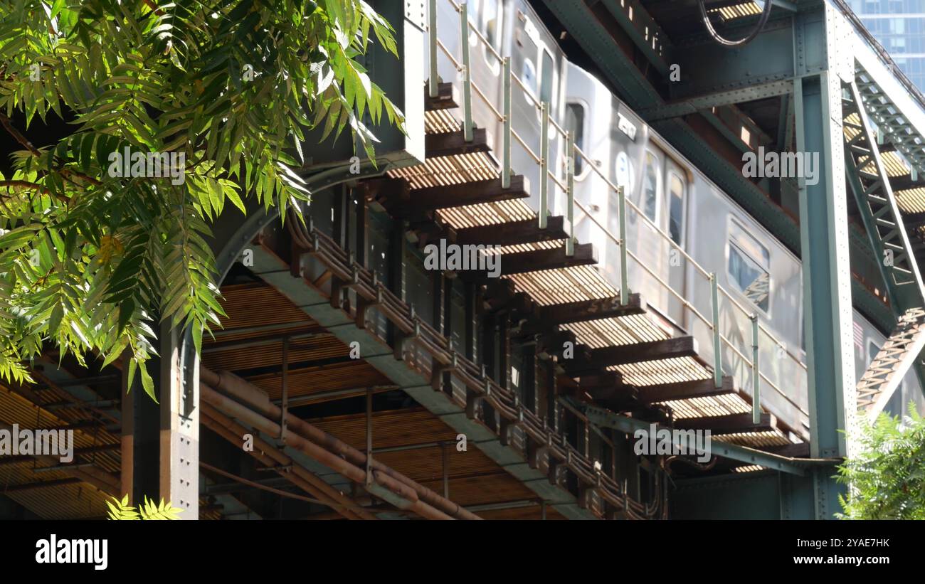 New York elevated subway, metropolitan bridge, metro track above street ...