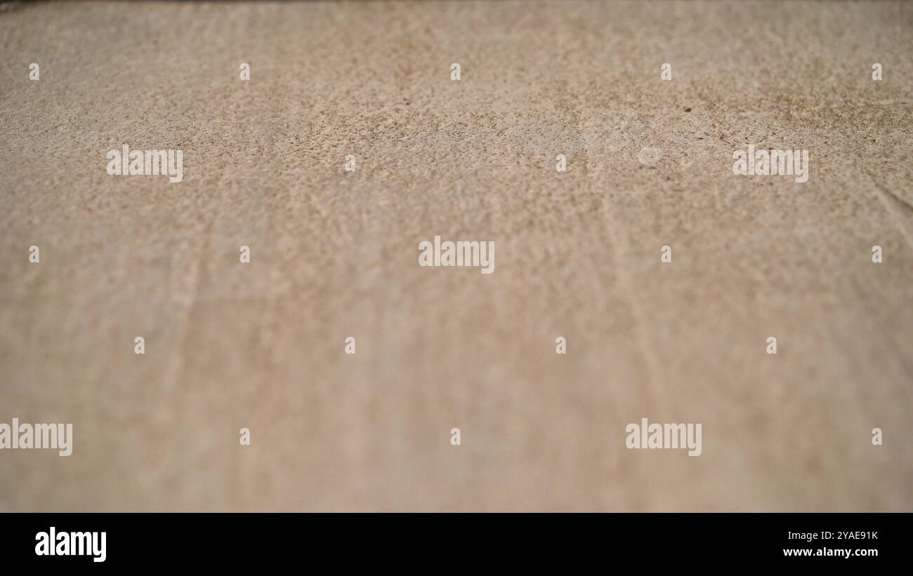 Polished concrete surface with a smooth finish, showcasing the subtle ...