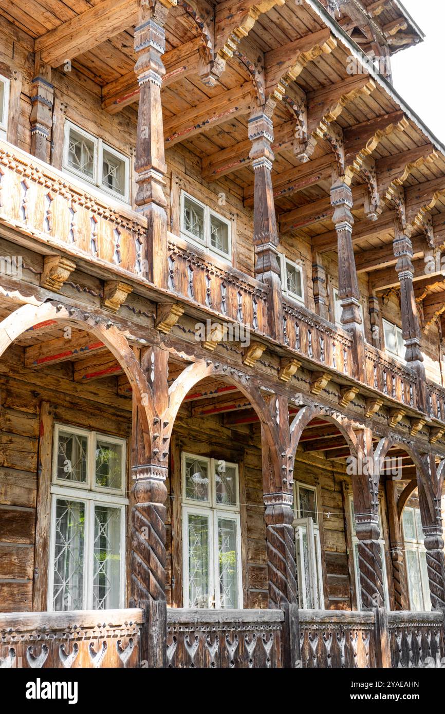 Wooden house timber. Windows and balcony of an old building Stock Photo ...