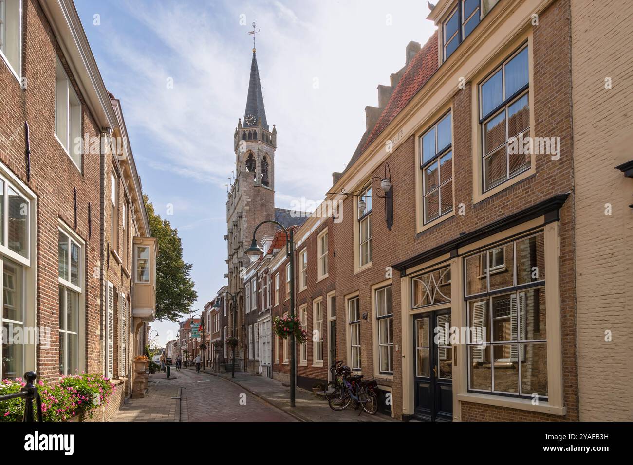 Street in the center of the city of Tholen with the medieval town hall ...