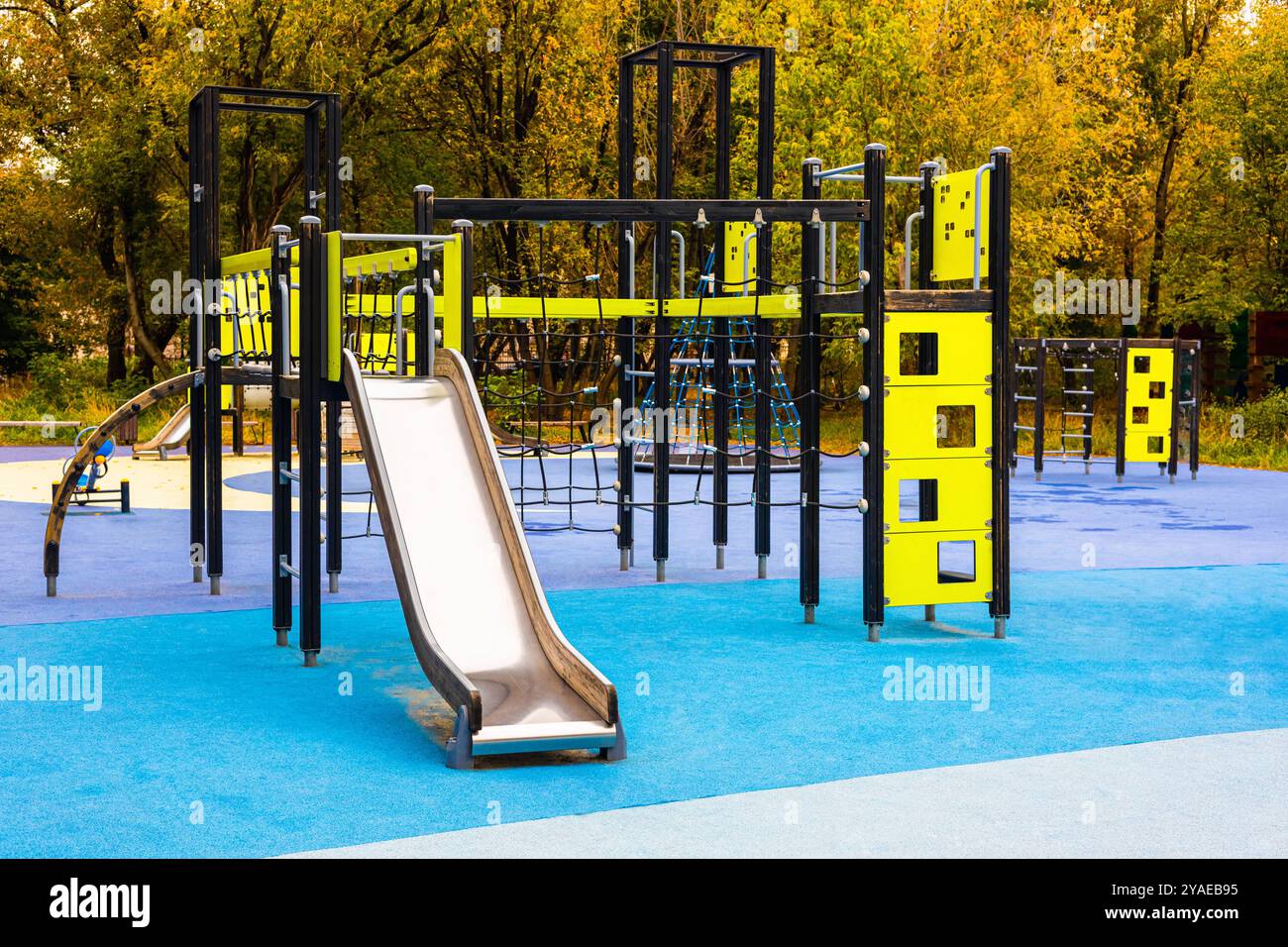 outdoor playground with metal slide without people. children's ...