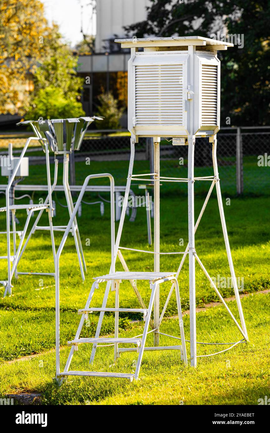 meteorological booth on a stand with an extension ladder ...