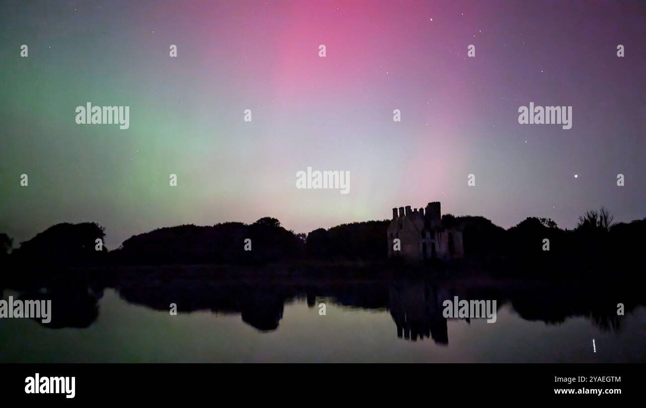 Aurora borealis, northern lights in the sky above Menlo castle, Galway ...