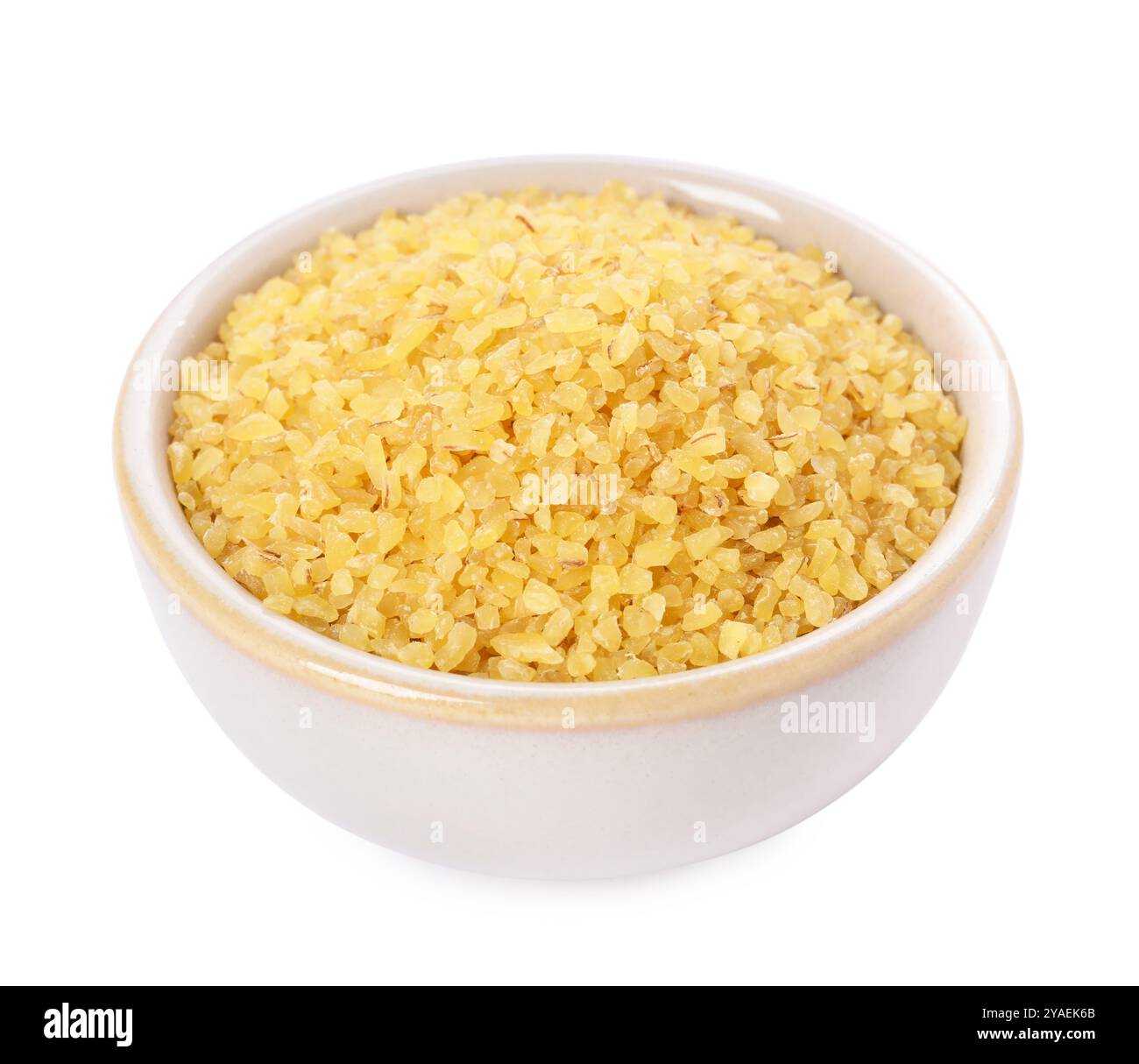 Raw bulgur in bowl isolated on white Stock Photo - Alamy