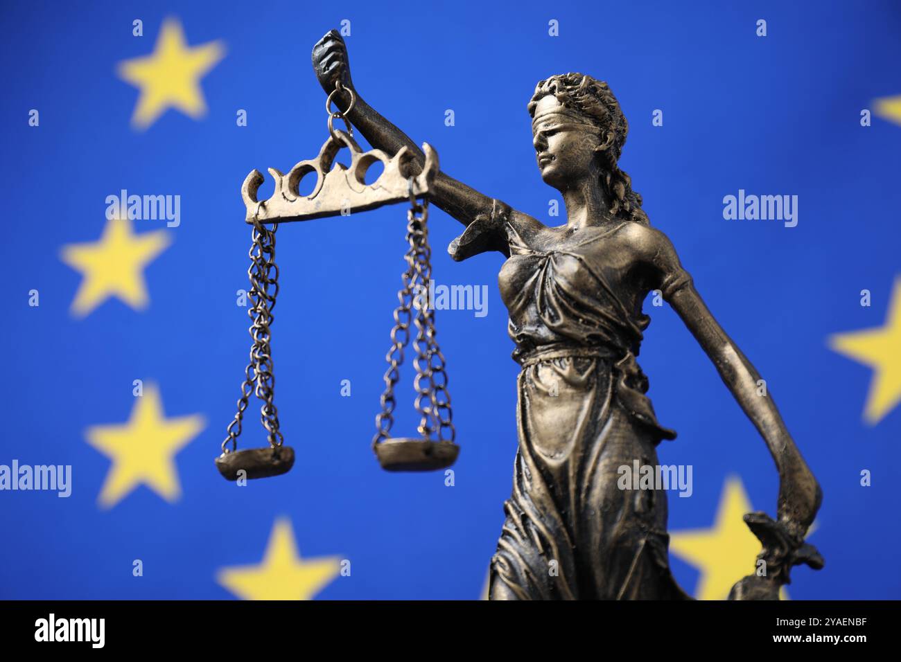 Figure of Lady Justice against European Union flag Stock Photo - Alamy
