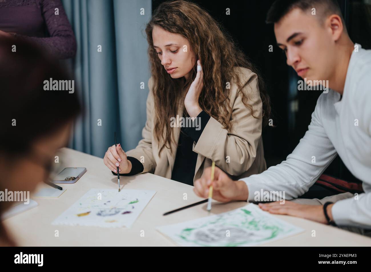 Group teens work together classroom hi-res stock photography and images ...